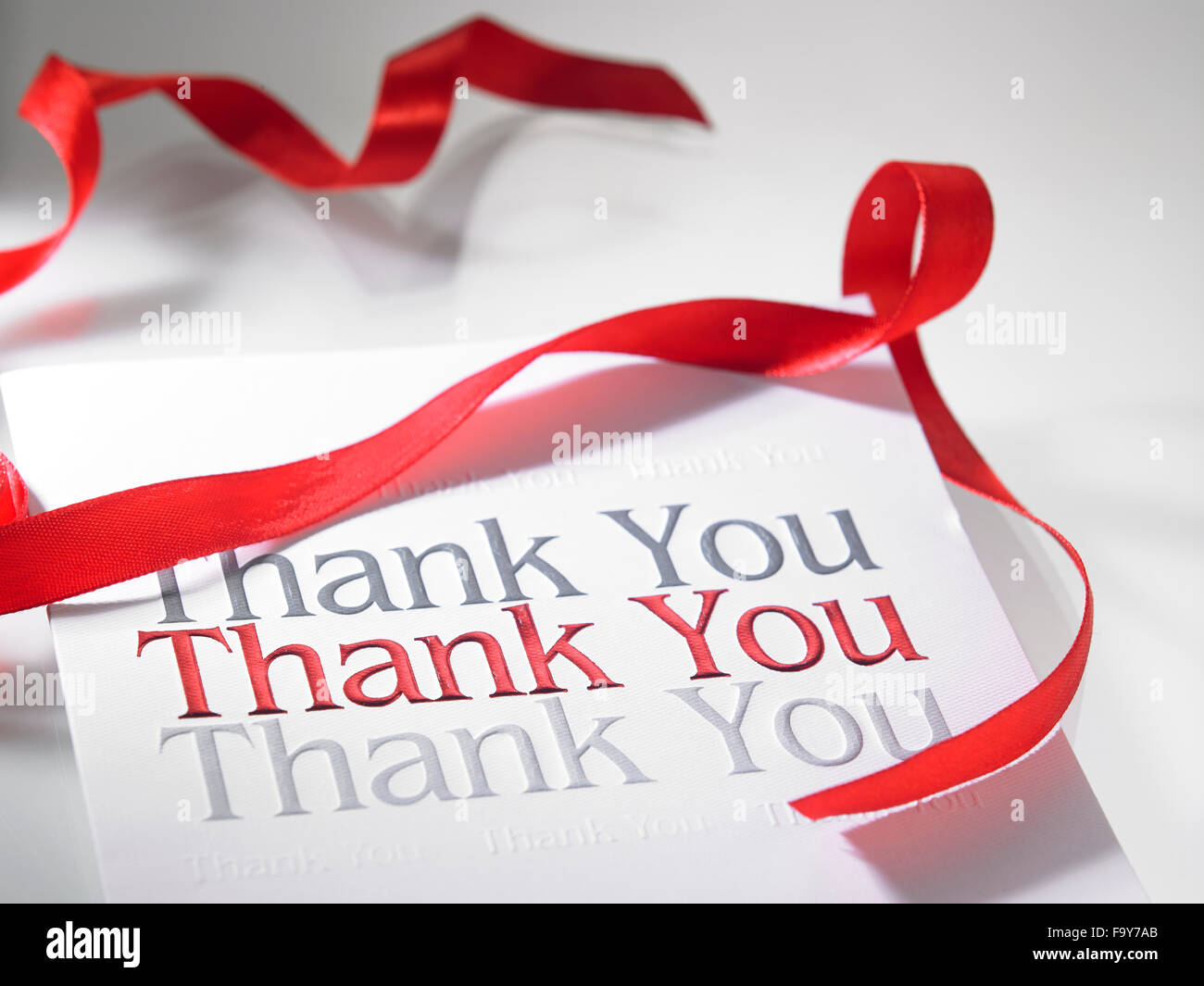 Thank you card with the ribbon Stock Photo - Alamy