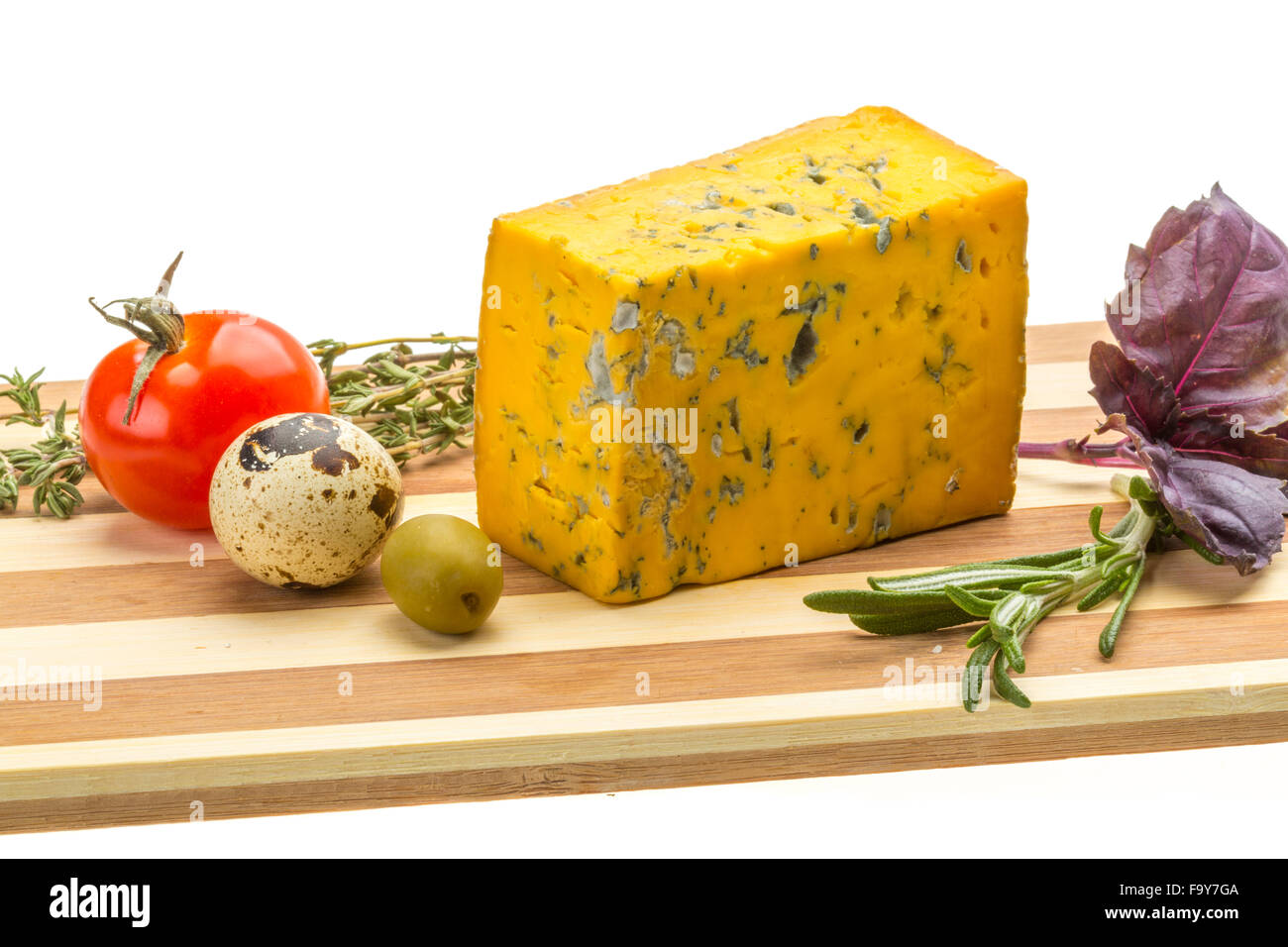 Yellow cheese with blue mold Stock Photo - Alamy