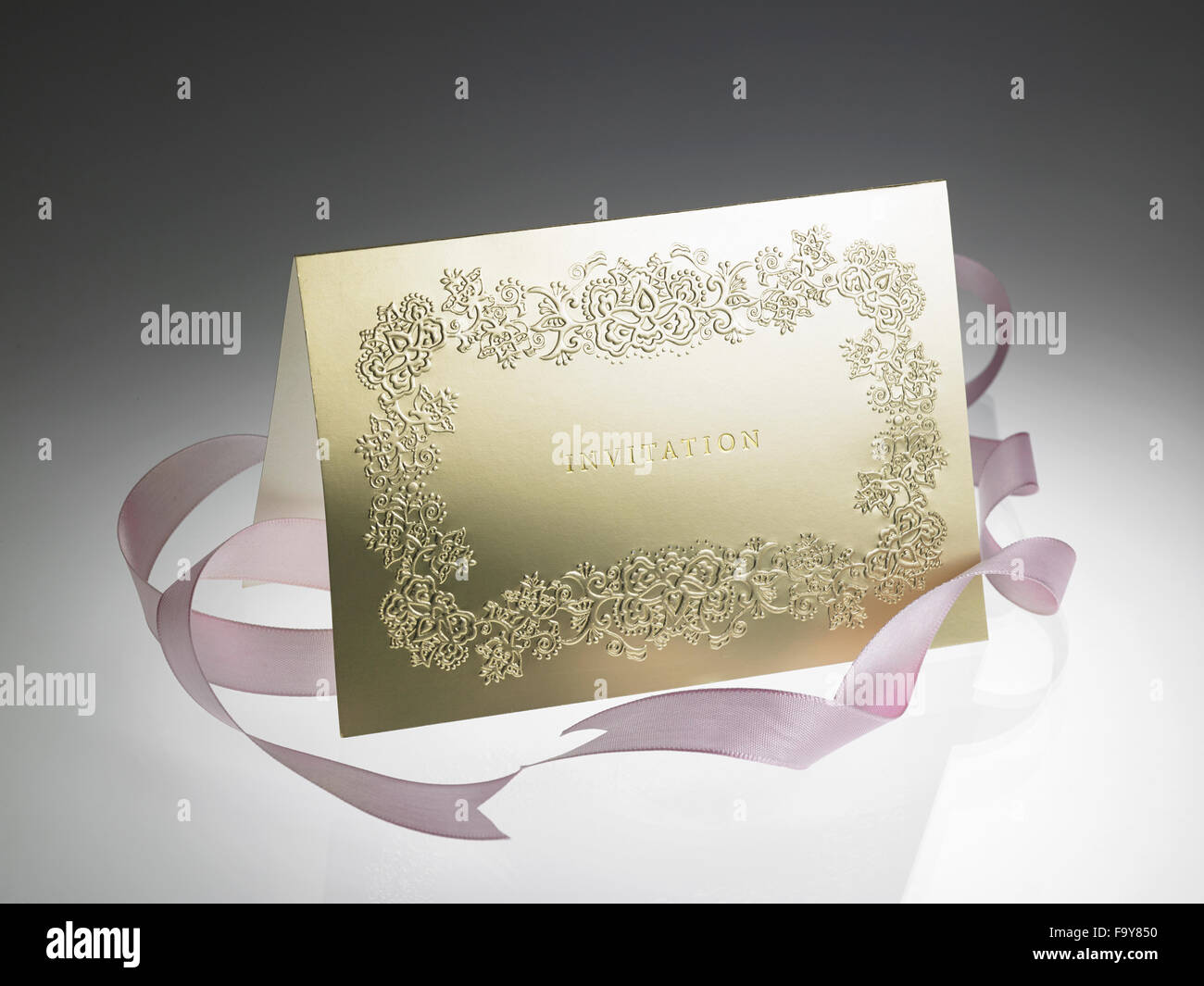 invitation card with pink ribbon Stock Photo - Alamy