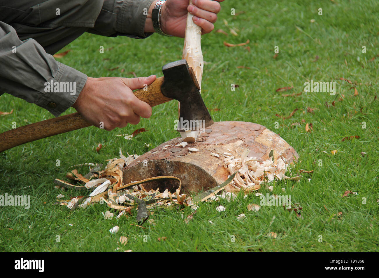 Using a Hand Axe for Shaping Wooden Craft Work Stock Photo - Alamy