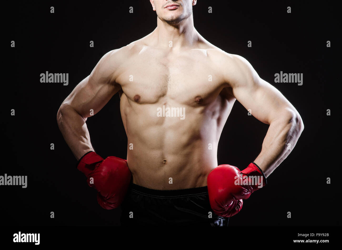 Muscular man in boxing concept Stock Photo - Alamy