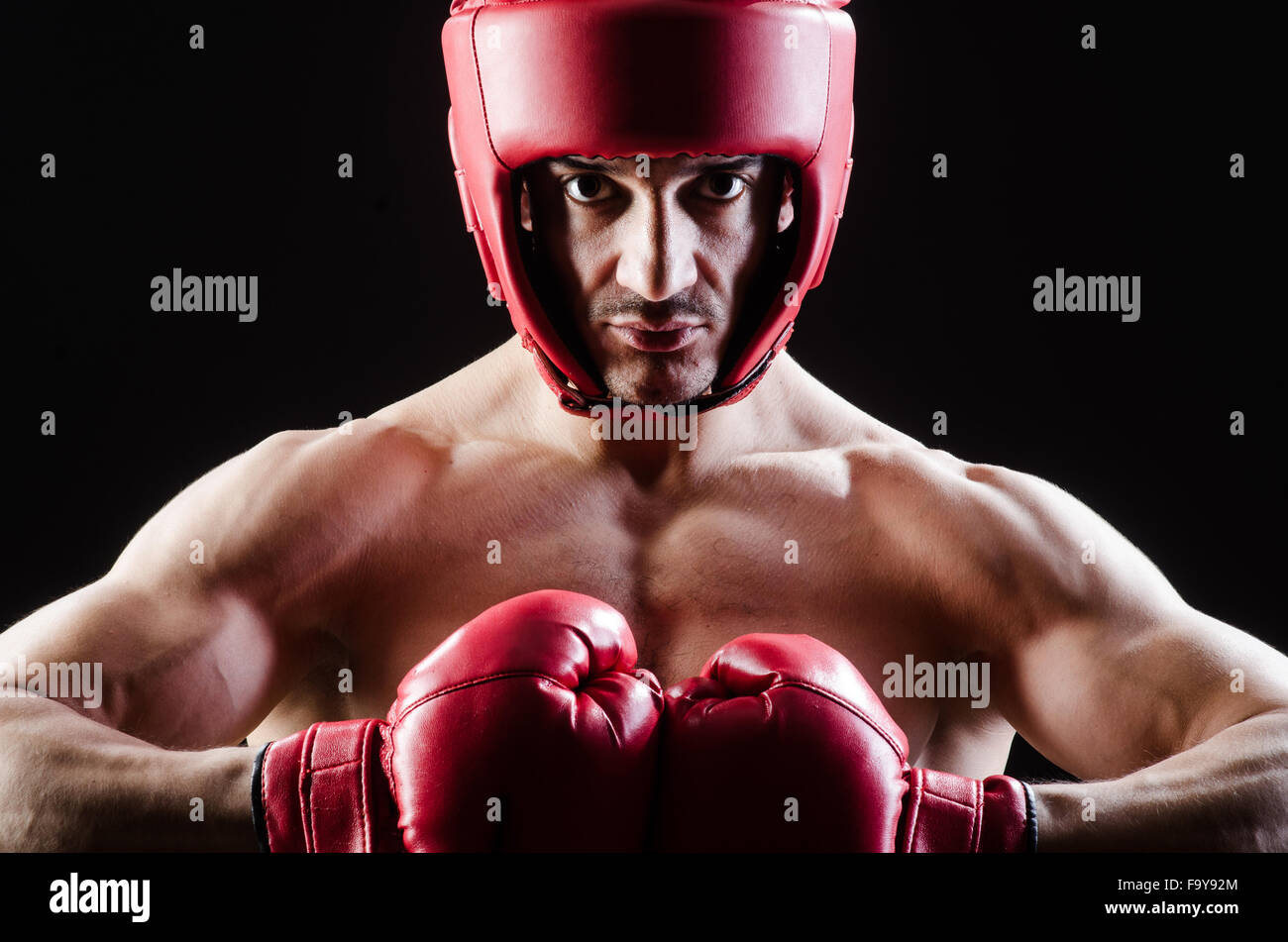 Muscular man in boxing concept Stock Photo - Alamy