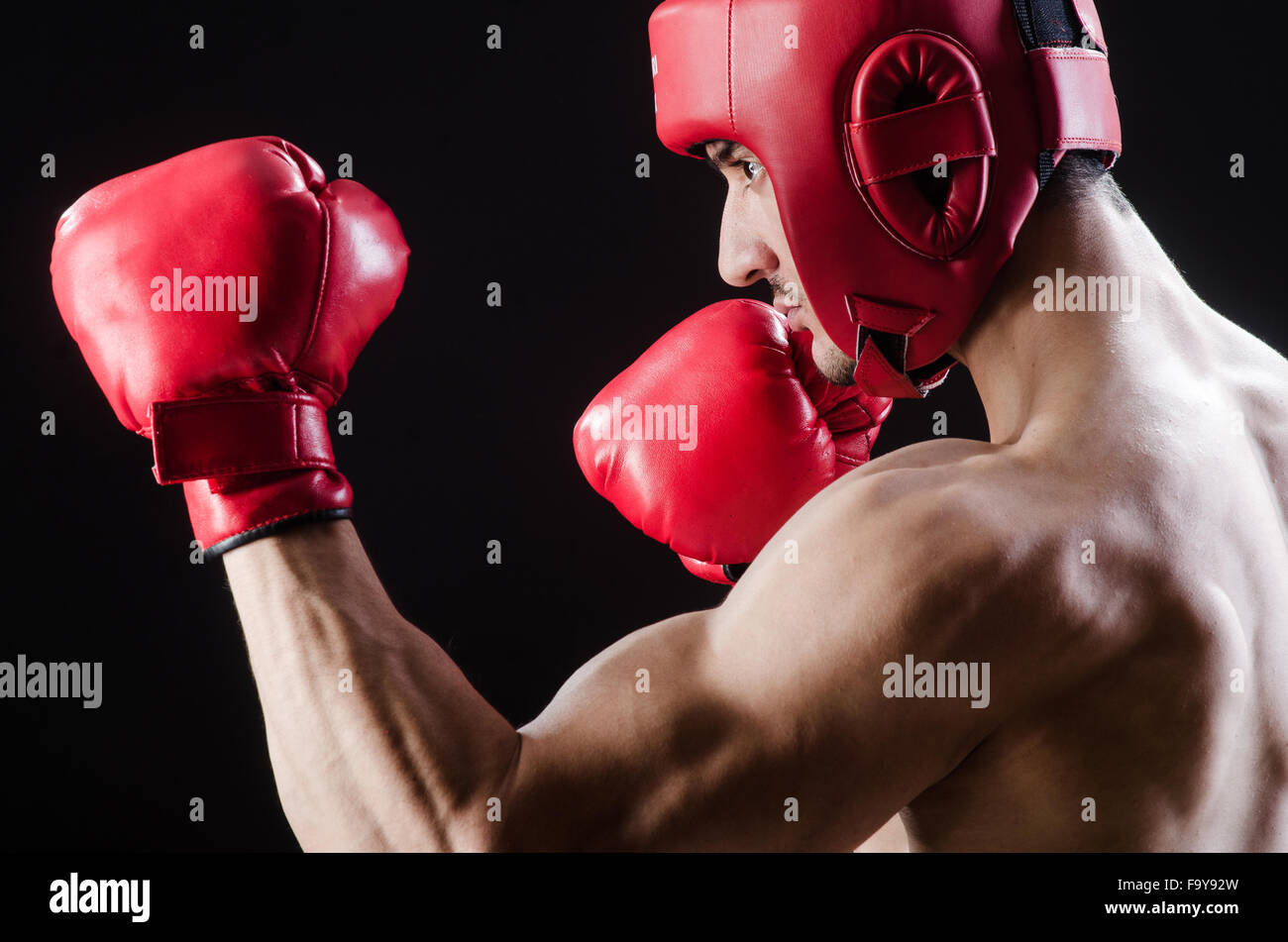 Muscular man in boxing concept Stock Photo - Alamy