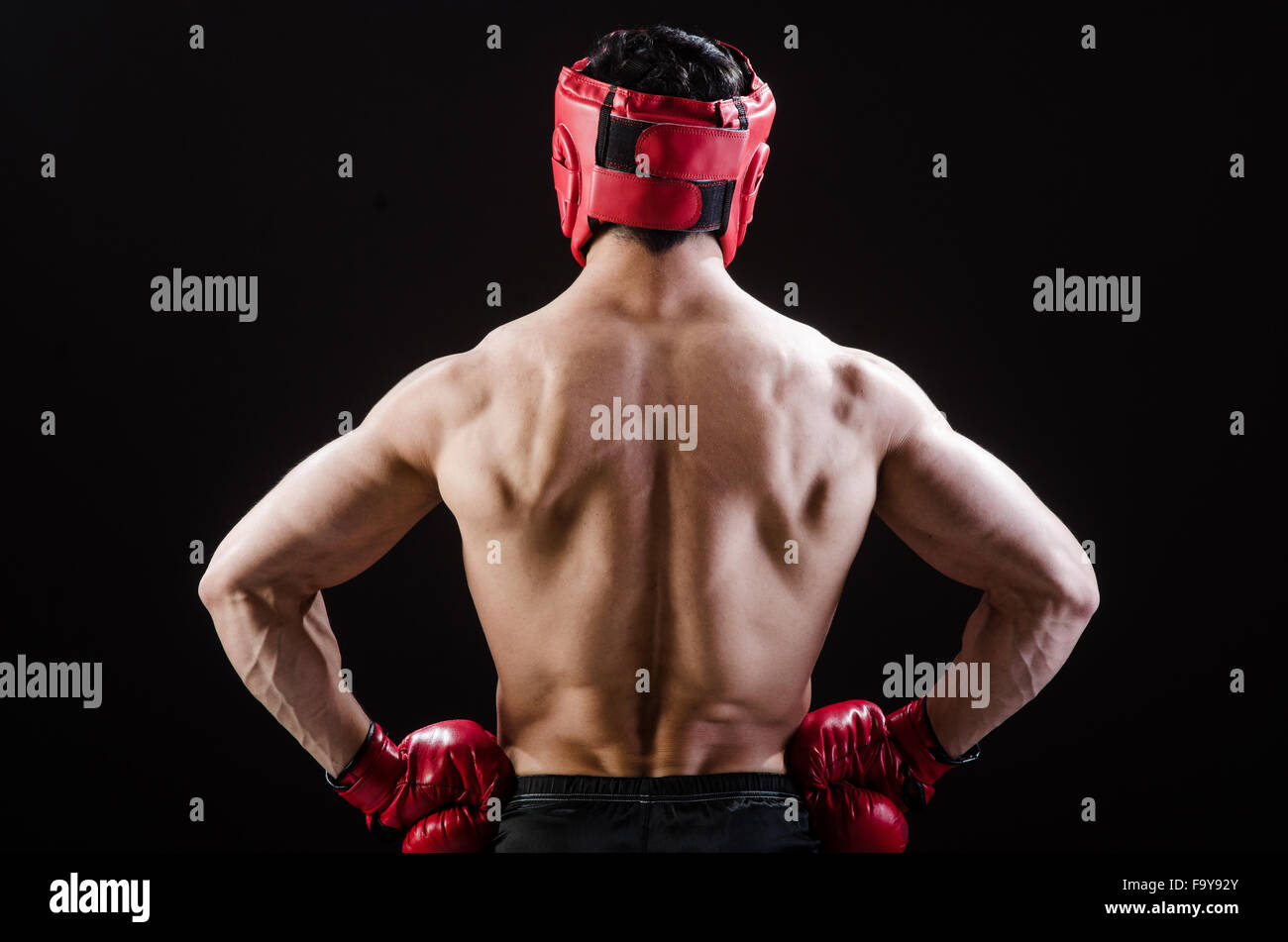 Muscular man in boxing concept Stock Photo - Alamy