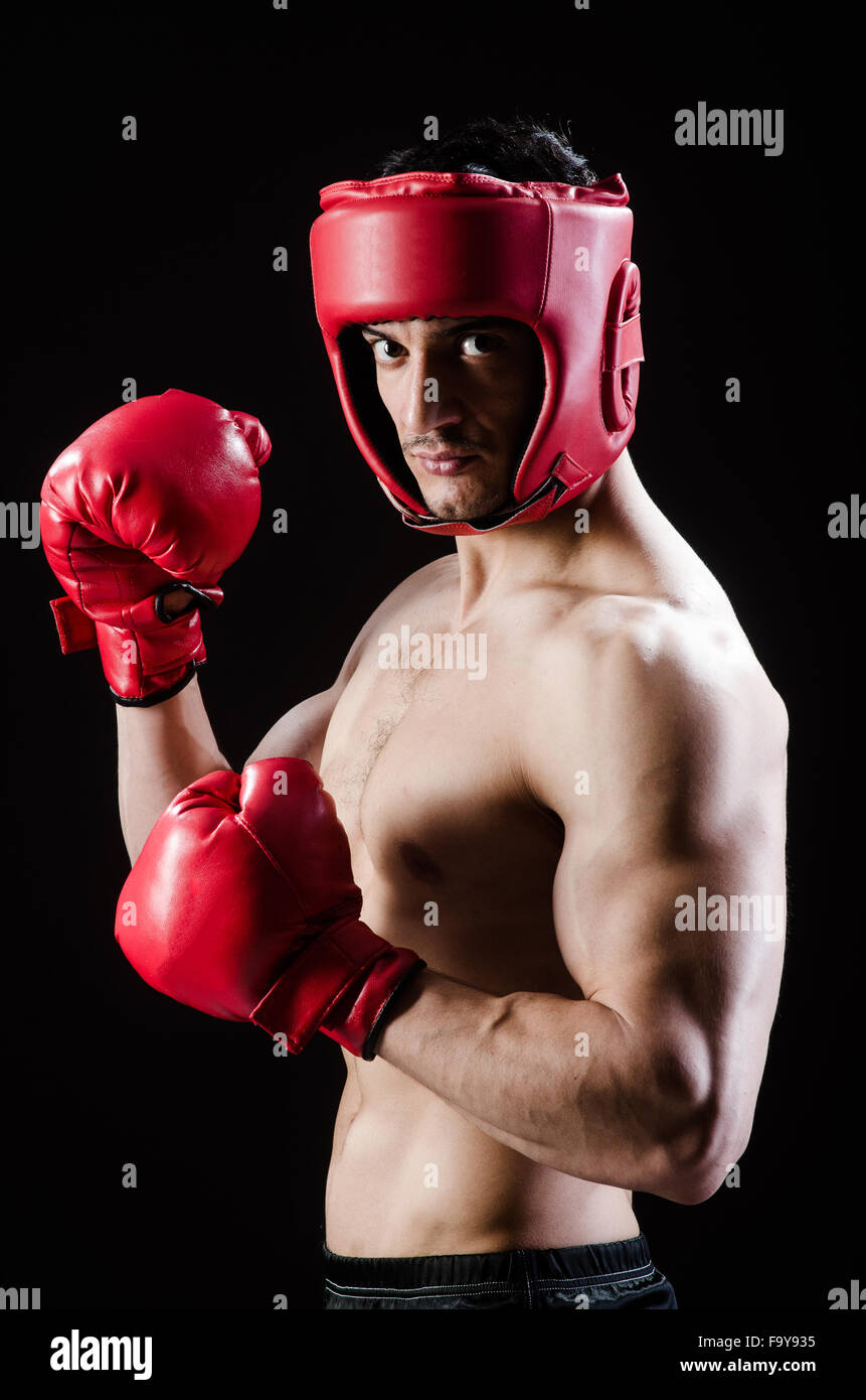 Muscular man in boxing concept Stock Photo - Alamy