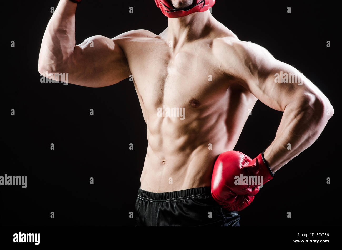 Muscular man in boxing concept Stock Photo - Alamy