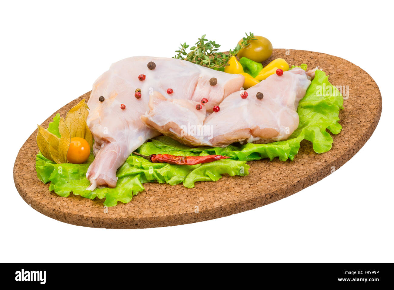 Raw rabbit meat with herbs and spices Stock Photo - Alamy