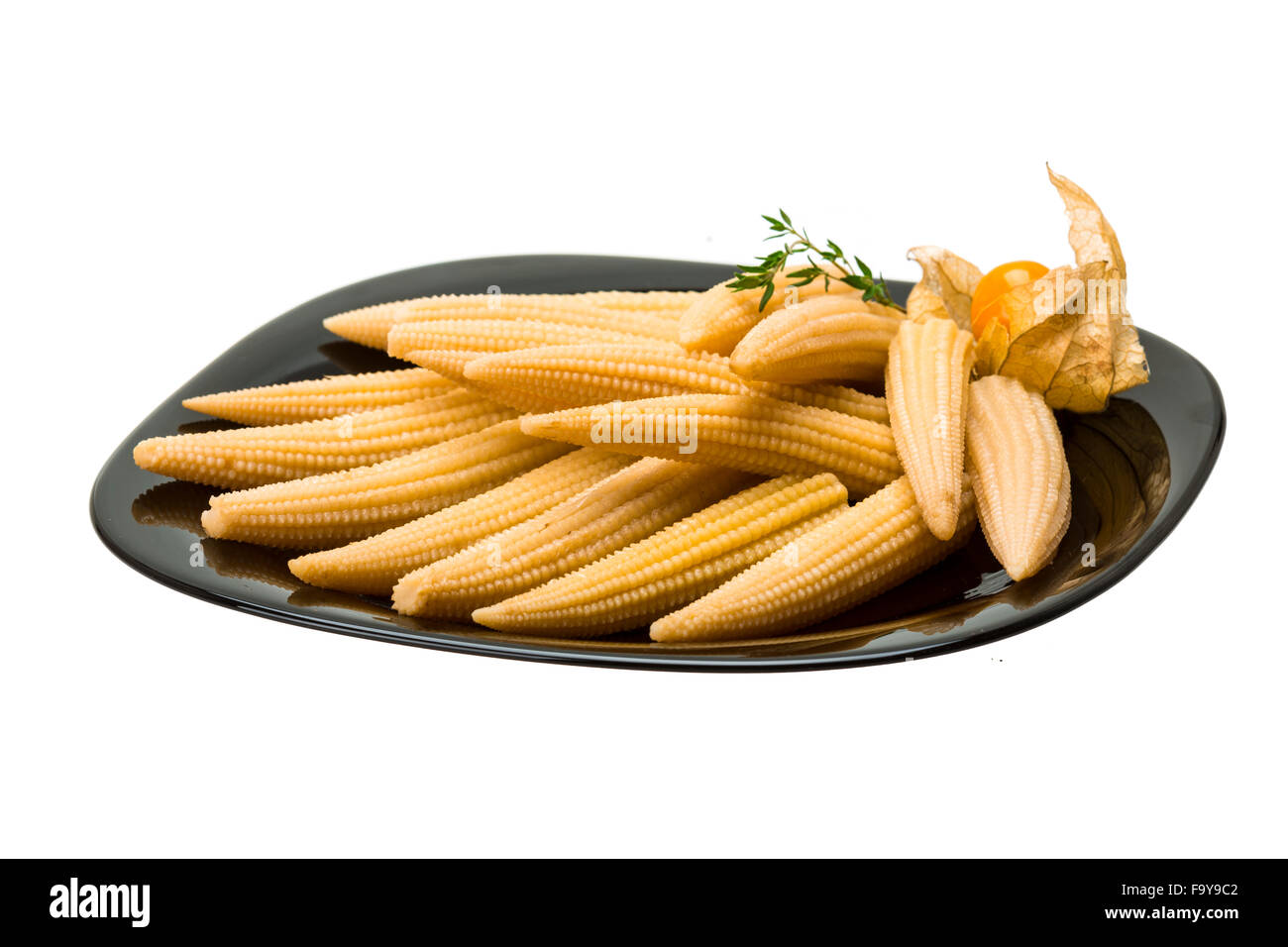 Baby corn isolated Stock Photo - Alamy