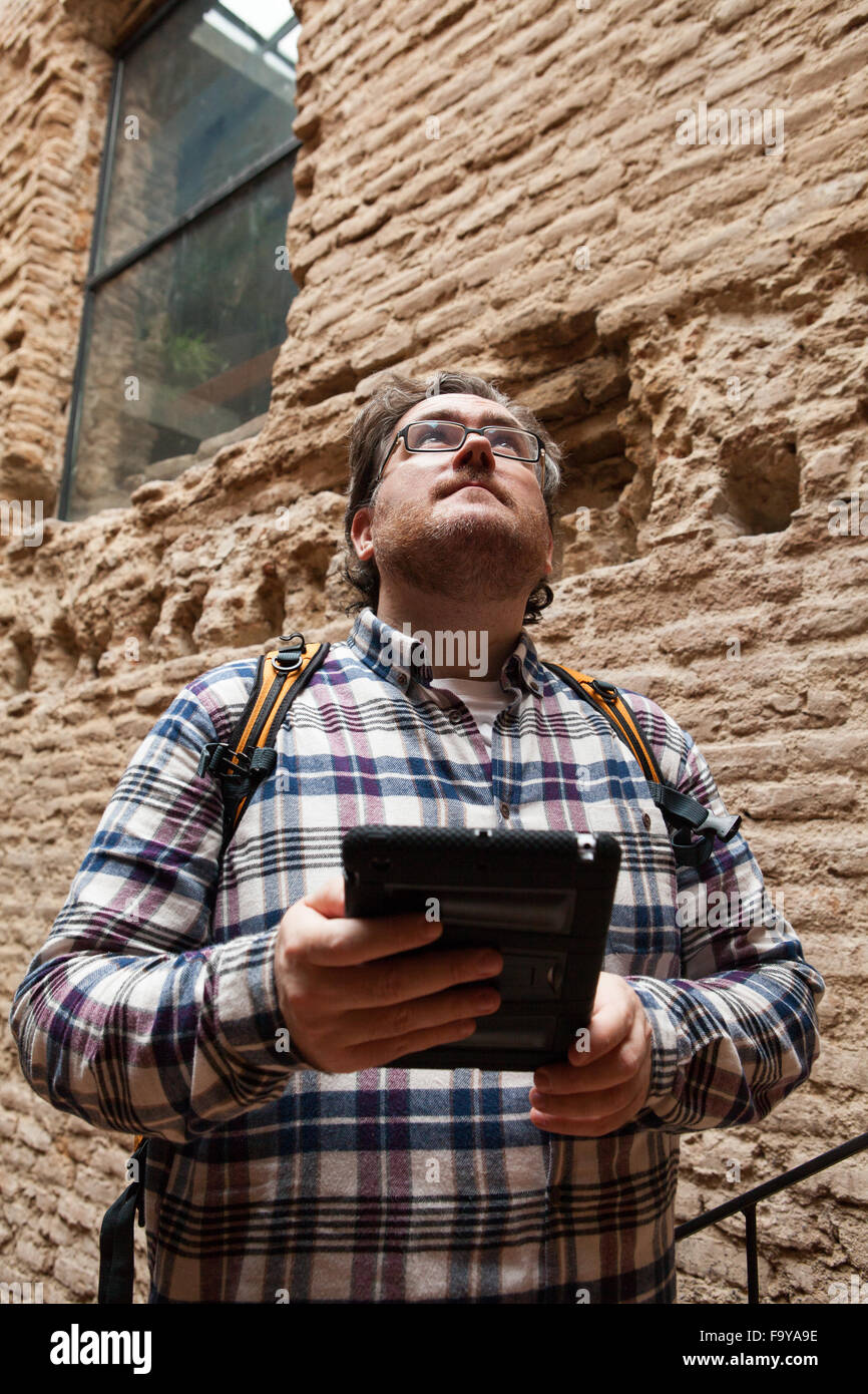 Young man searching information in hi-res stock photography and images ...