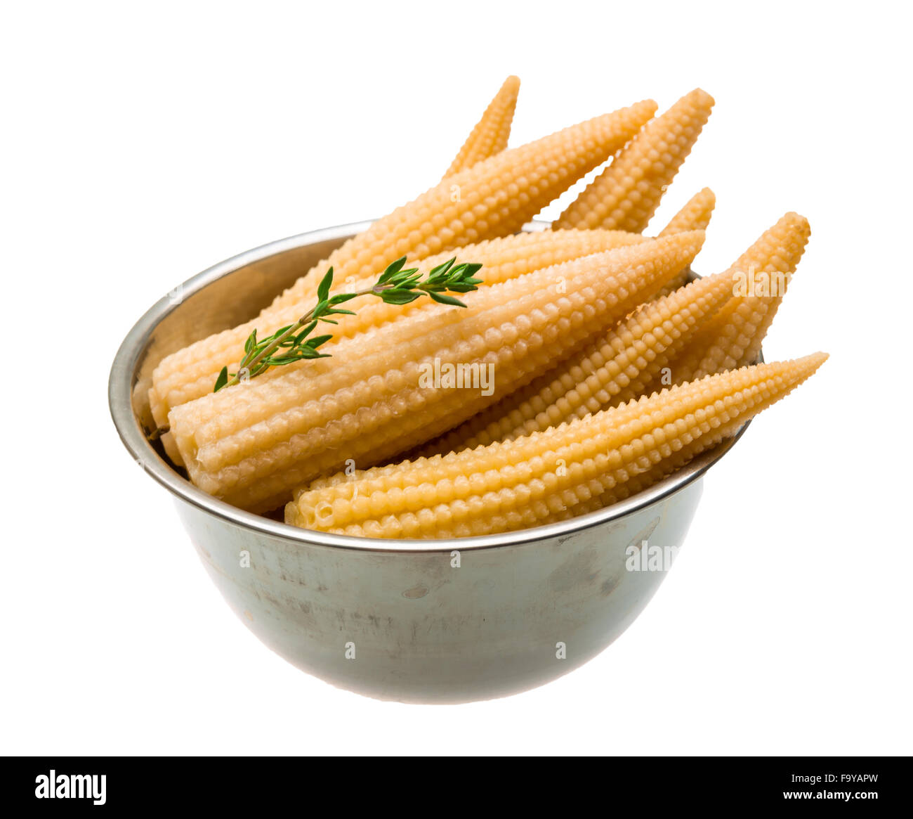 Baby corn with thyme Stock Photo - Alamy