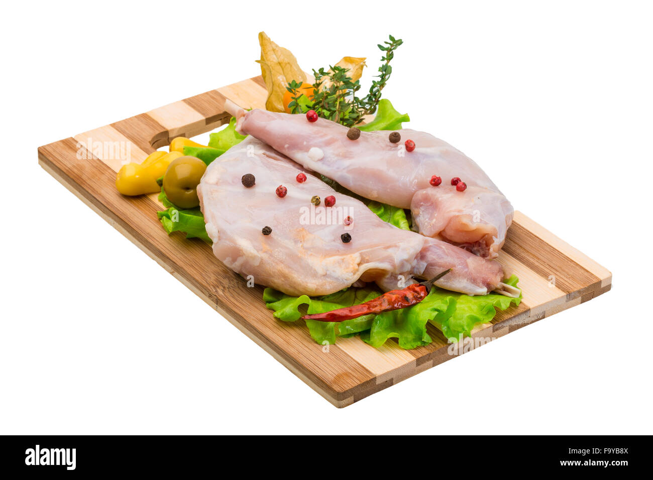 Raw rabbit meat with herbs and spices Stock Photo - Alamy