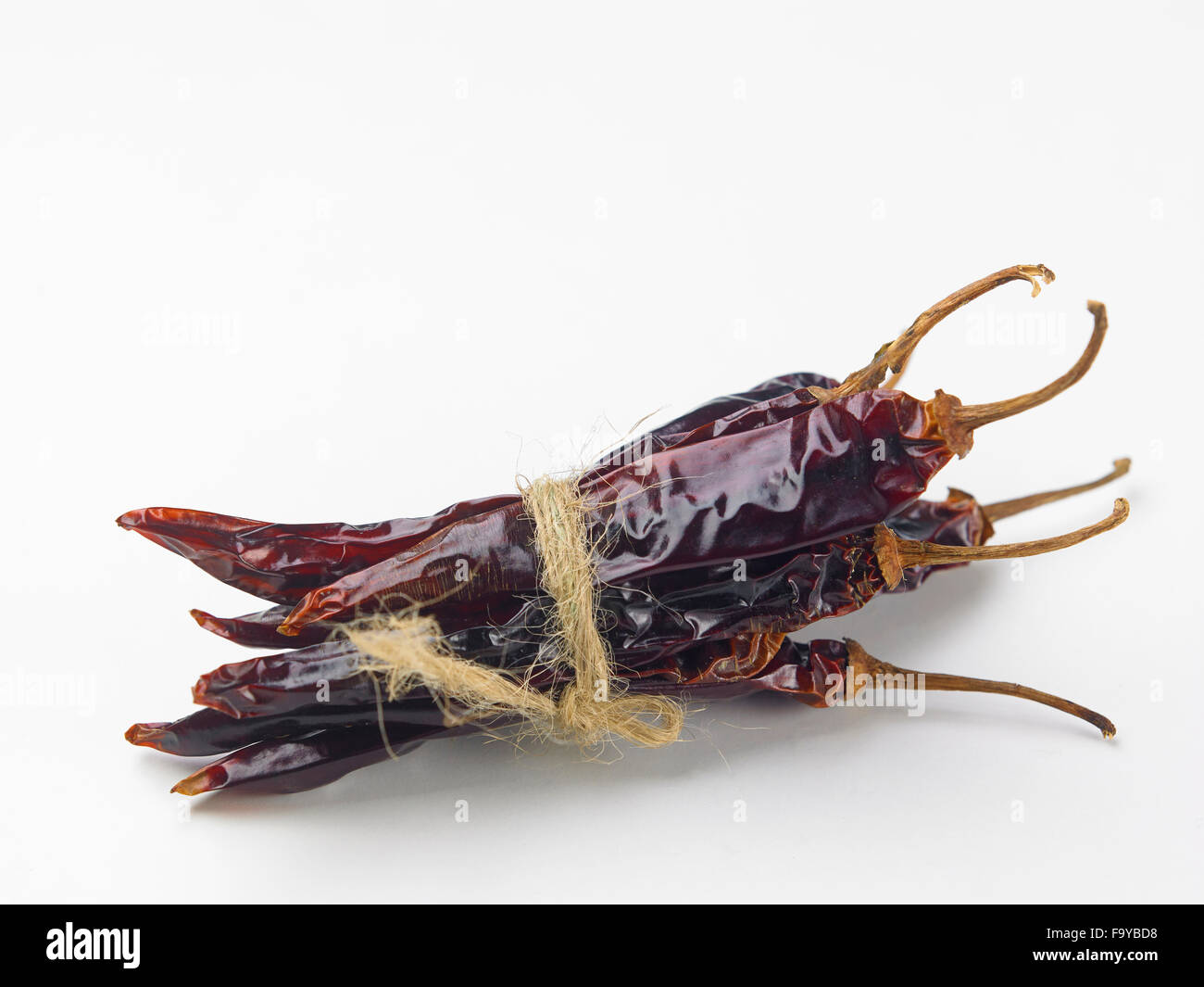 bunch of the dried chilli on white background Stock Photo - Alamy