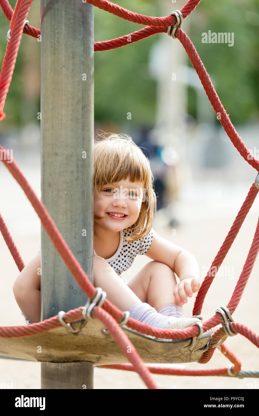 child on ropes at playground area Stock Photo - Alamy