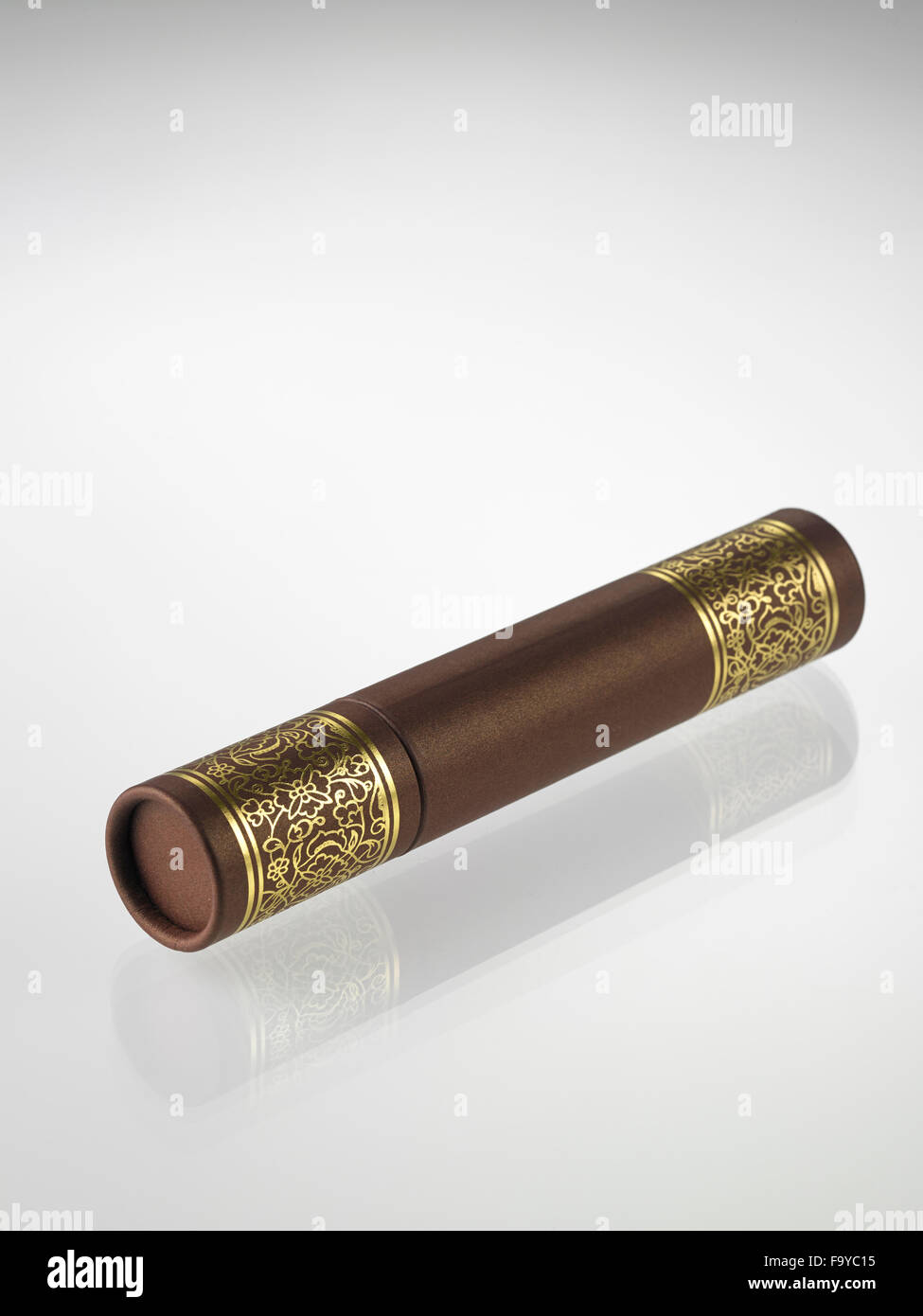 Graduation Scroll Container On White Background Stock Photo - Alamy