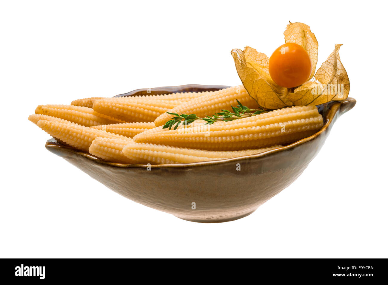 Baby corn with thyme Stock Photo - Alamy
