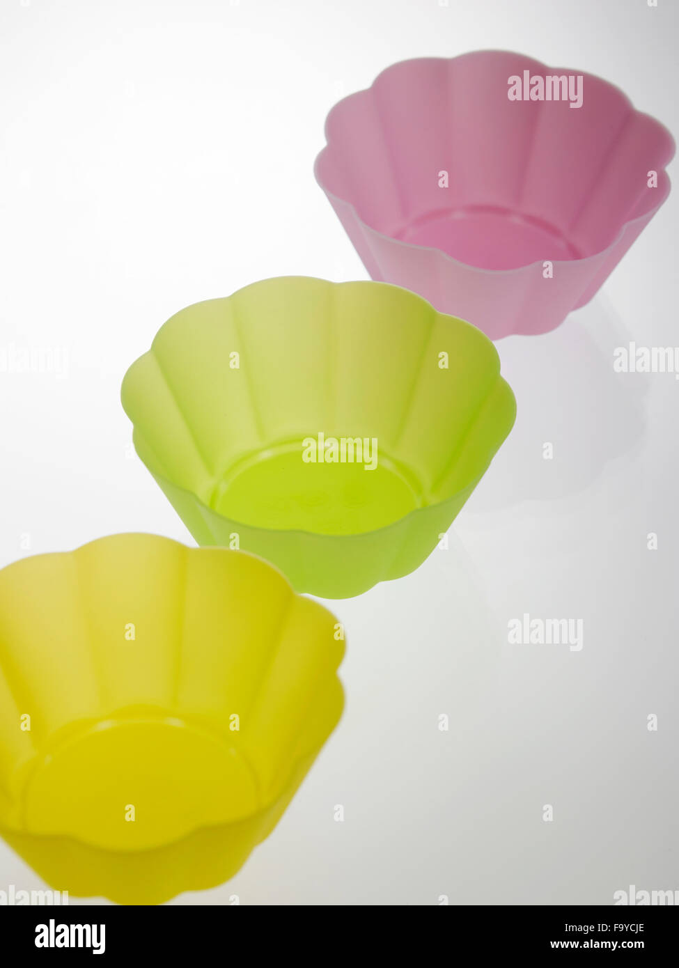 colorful cupcake wrapper on the white background Stock Photo - Alamy