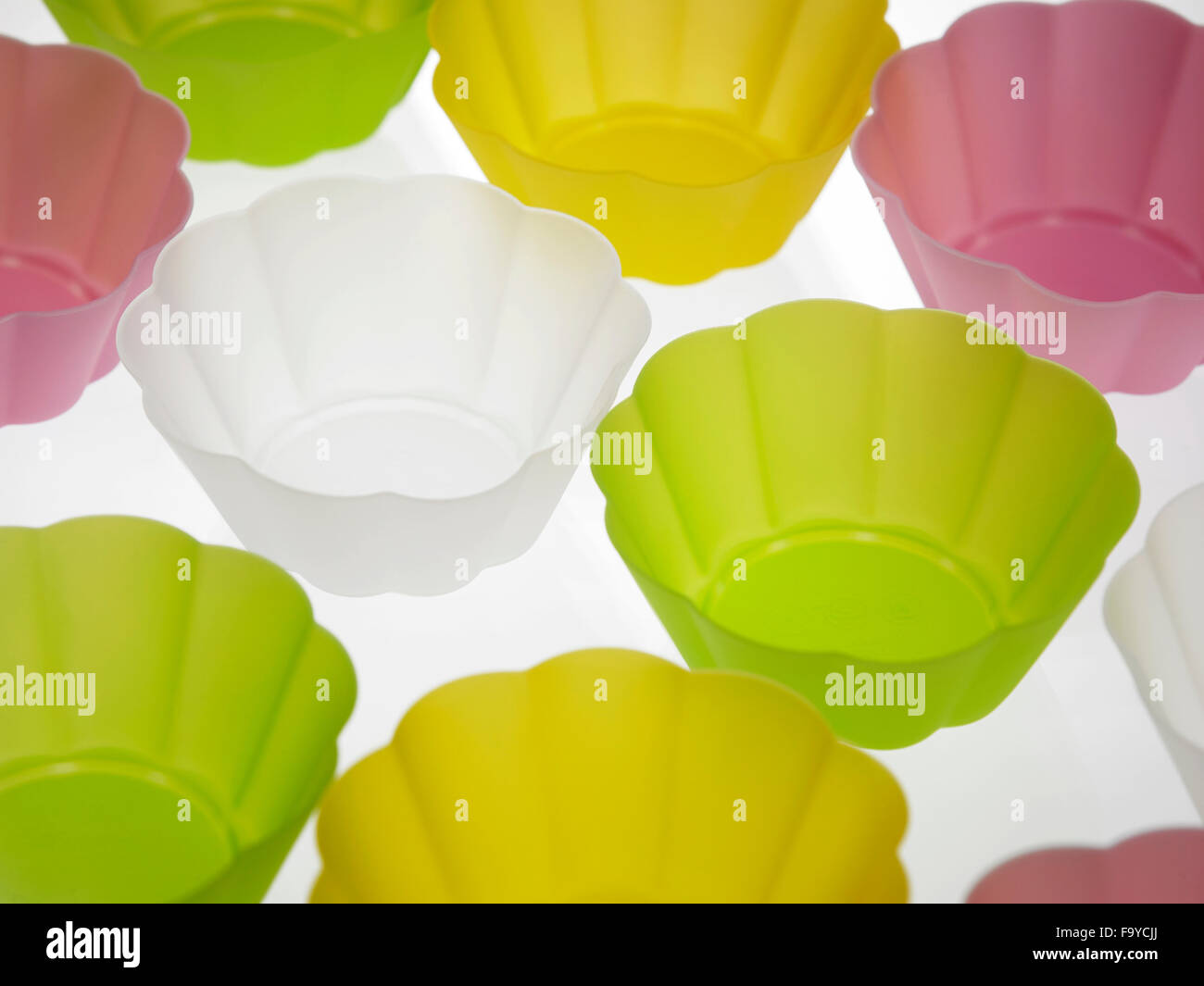 colorful cupcake wrapper on the white background Stock Photo - Alamy