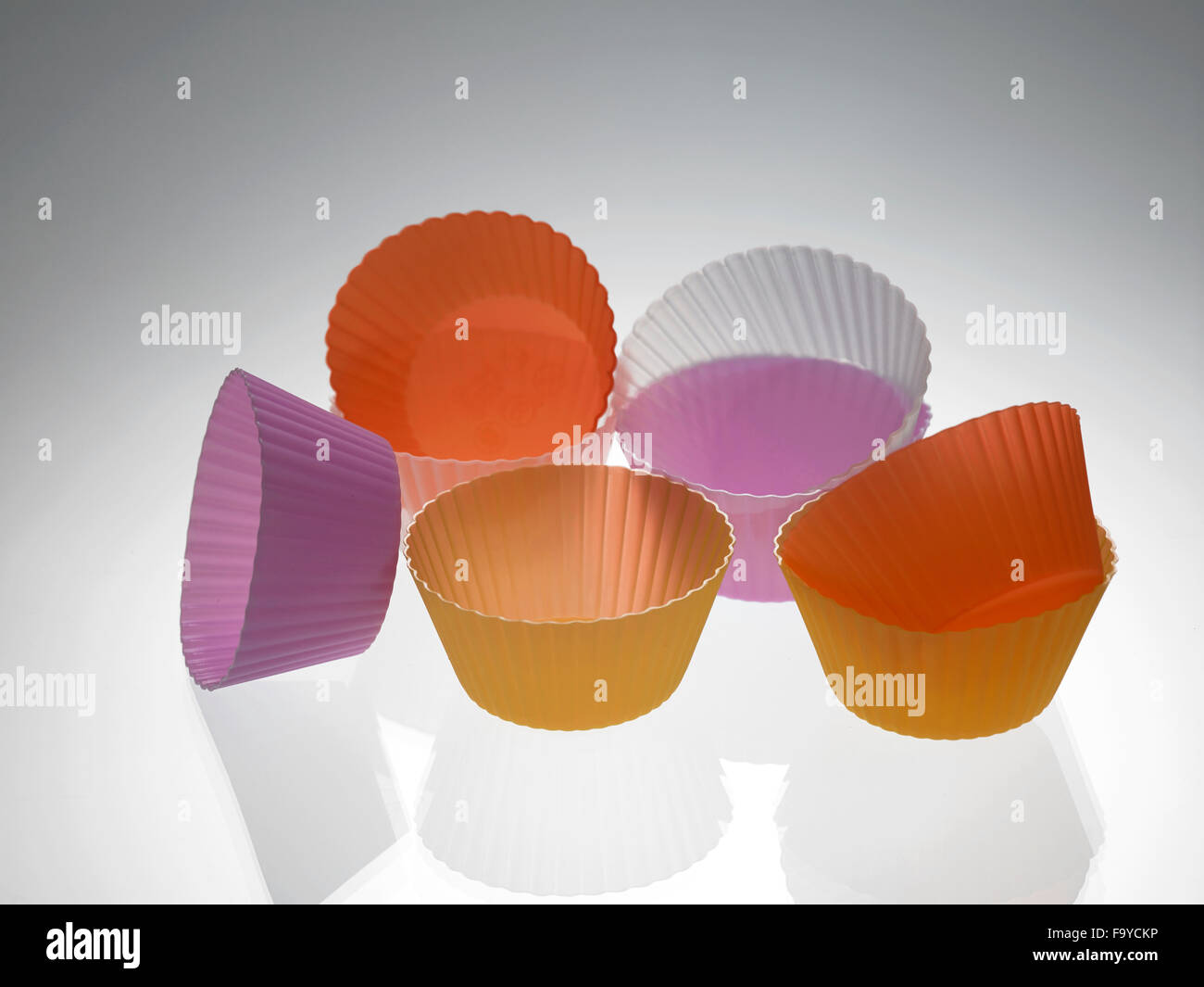colorful cupcake wrapper on the white background Stock Photo - Alamy