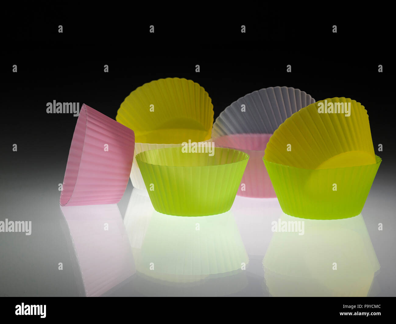 colorful cupcake wrapper on the white background Stock Photo - Alamy