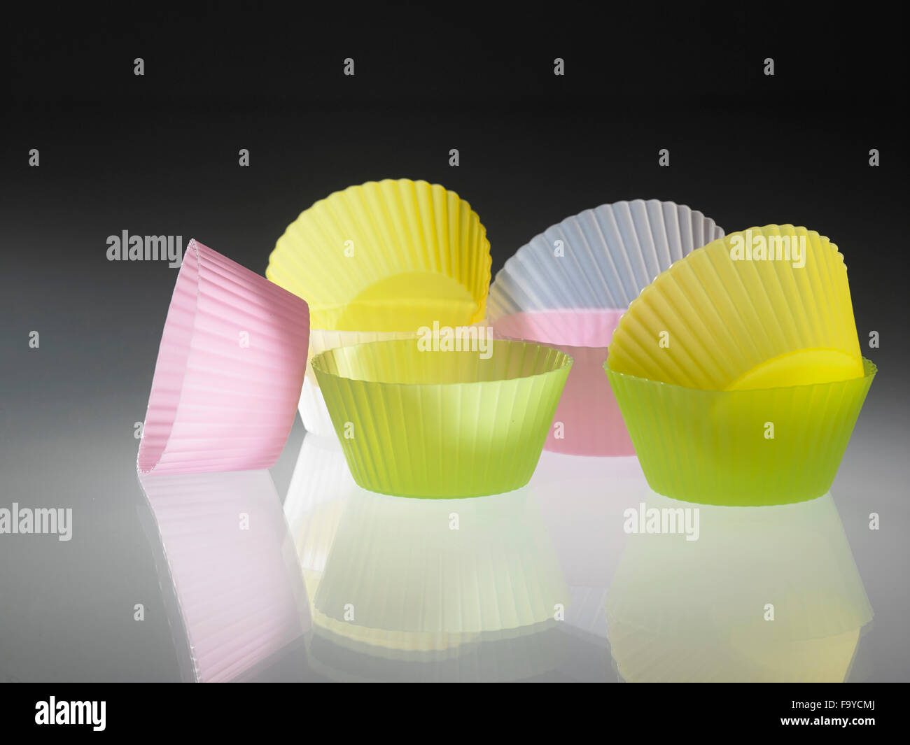 colorful cupcake wrapper on the white background Stock Photo - Alamy