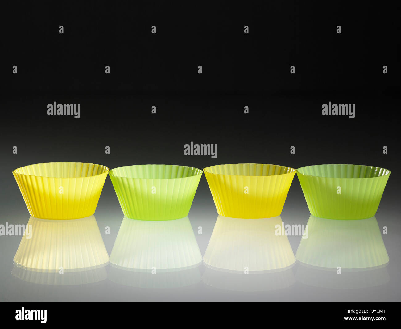 muffin holder in a row Stock Photo - Alamy