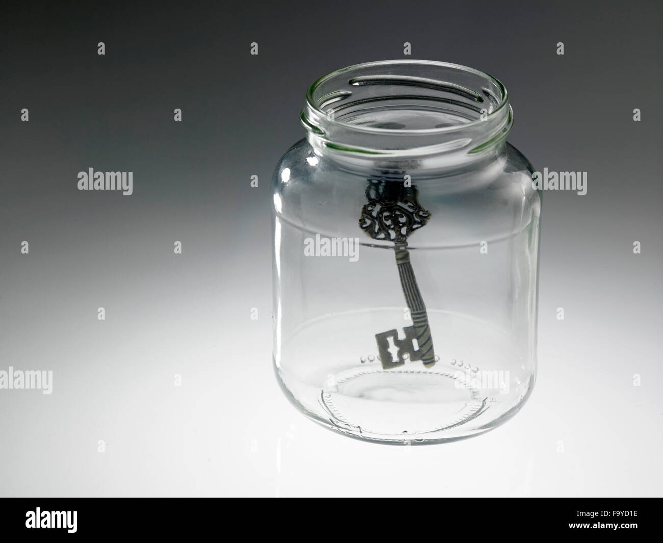 key in the empty jar Stock Photo - Alamy
