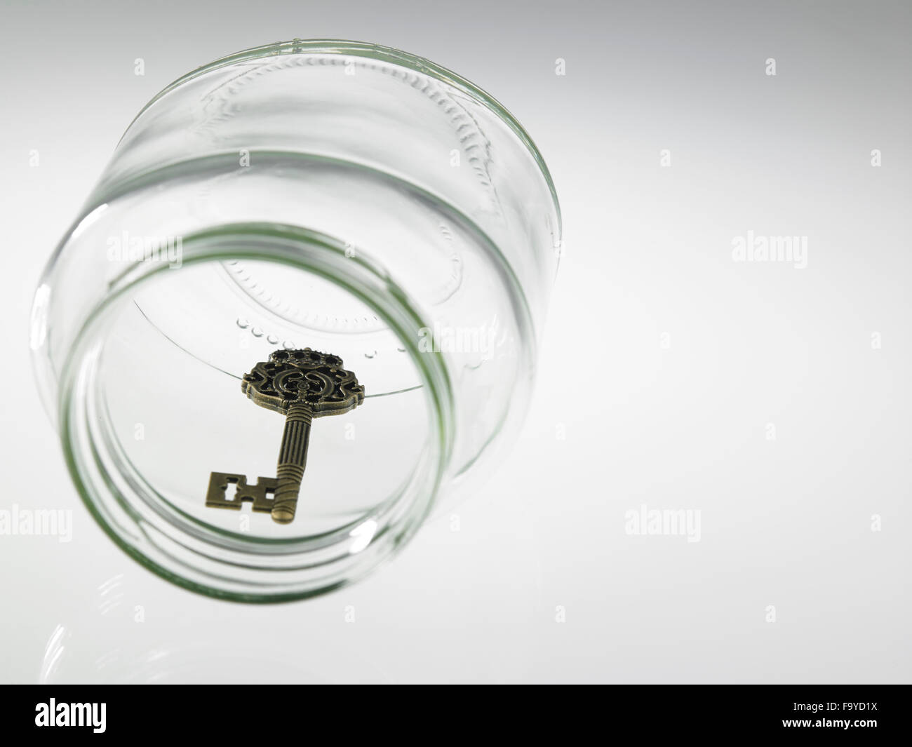 key in the empty jar Stock Photo - Alamy