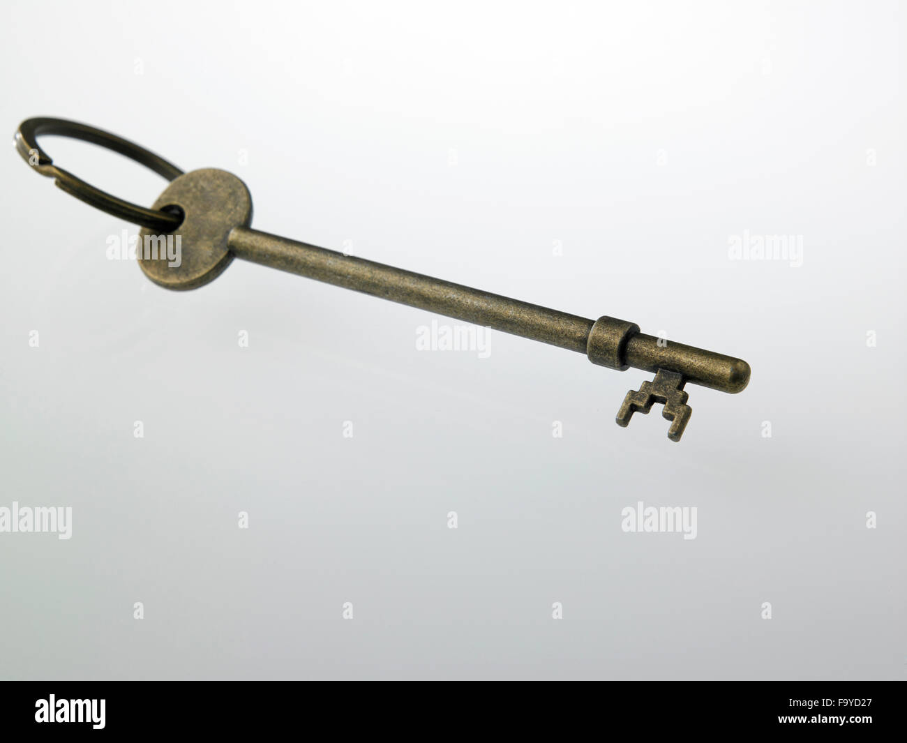 retro key on the white background Stock Photo - Alamy