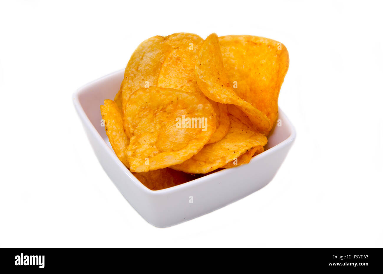 Chips paprika on square bowl on a white background Stock Photo - Alamy