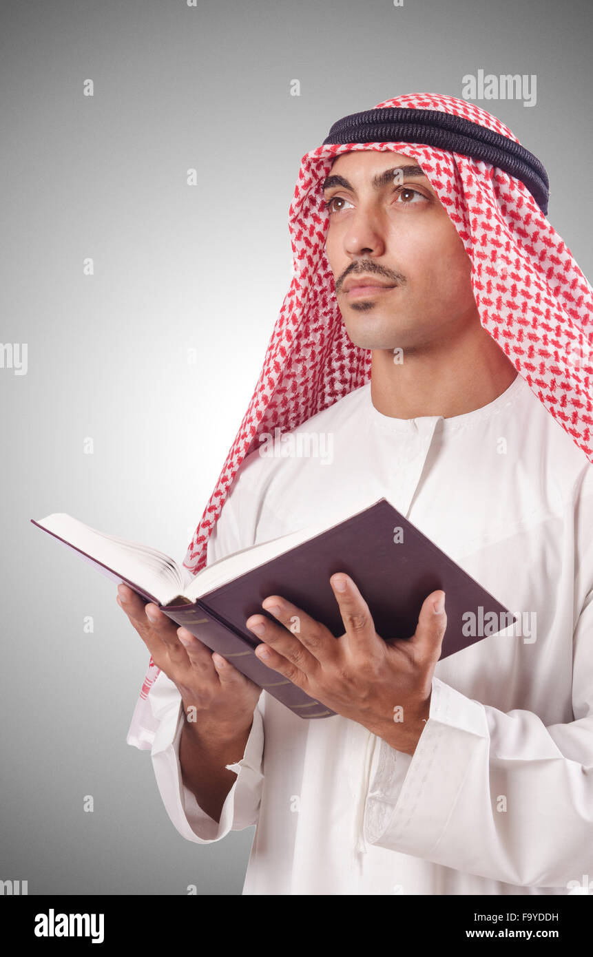 Arab man praying on white Stock Photo - Alamy