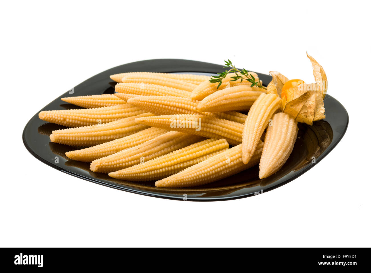 Baby corn isolated Stock Photo - Alamy