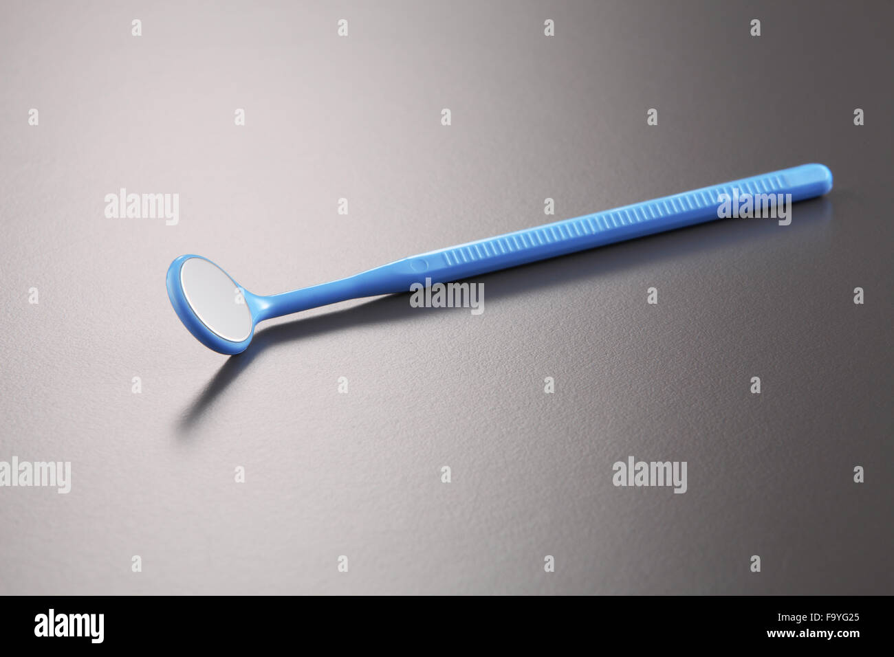 Basic dentist tools isolated on gray Stock Photo - Alamy