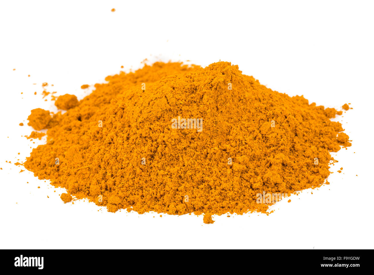 Curcuma powder heap isolated Stock Photo - Alamy