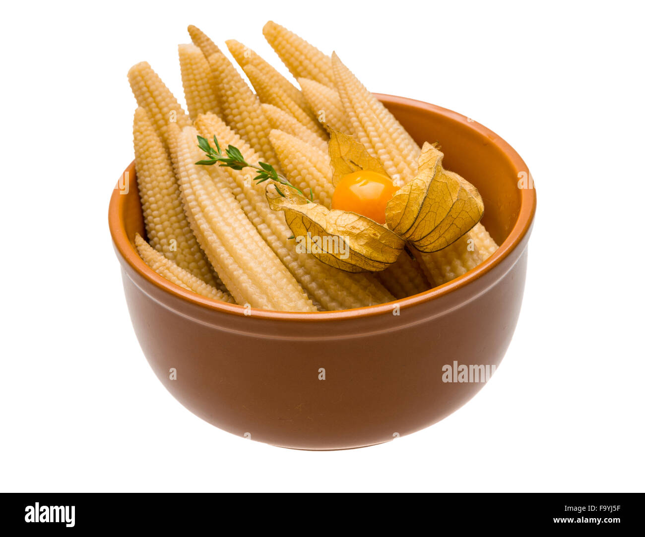 Baby corn with thyme Stock Photo - Alamy