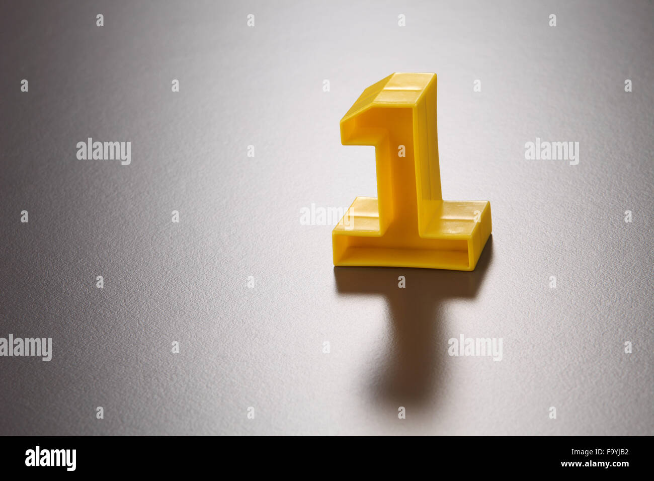 number one on the gray background Stock Photo - Alamy