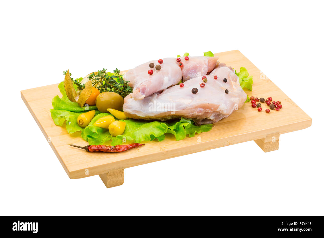 Raw rabbit meat with herbs and spices Stock Photo - Alamy