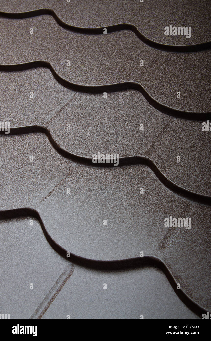 Close up of metal roof tile Stock Photo - Alamy