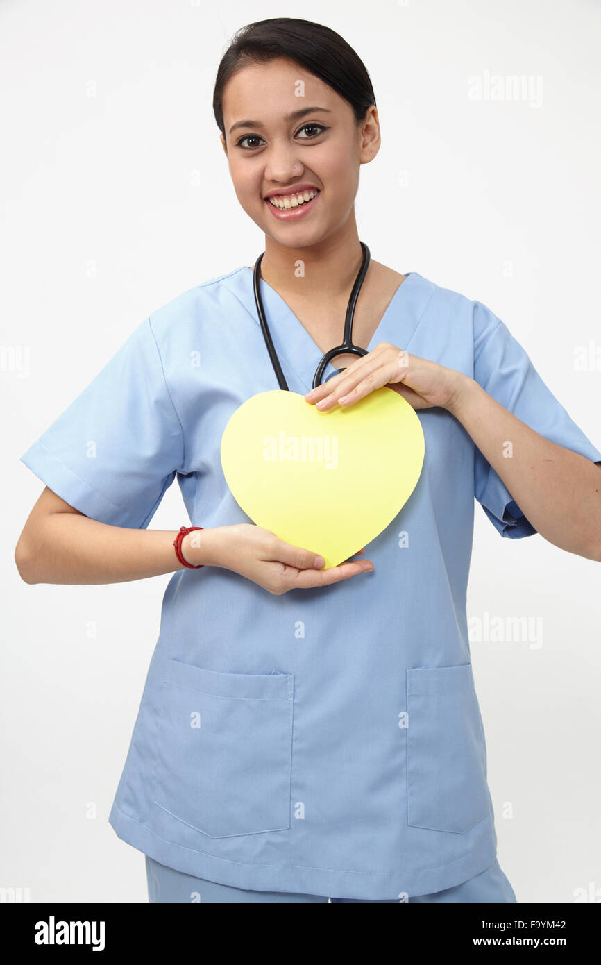 Doctor showing model heart hi-res stock photography and images - Alamy