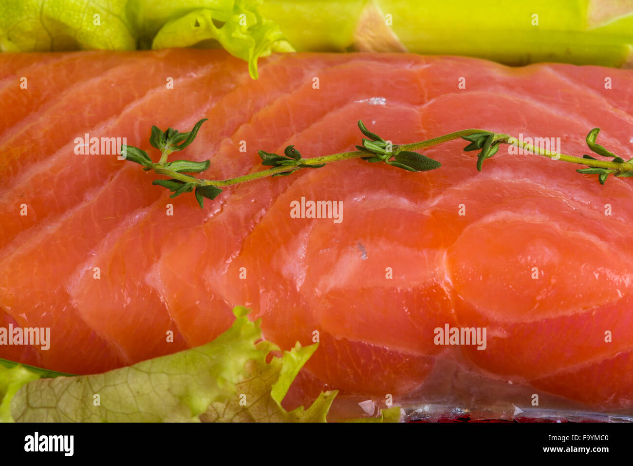 Salmon fillet garnished Stock Photo - Alamy