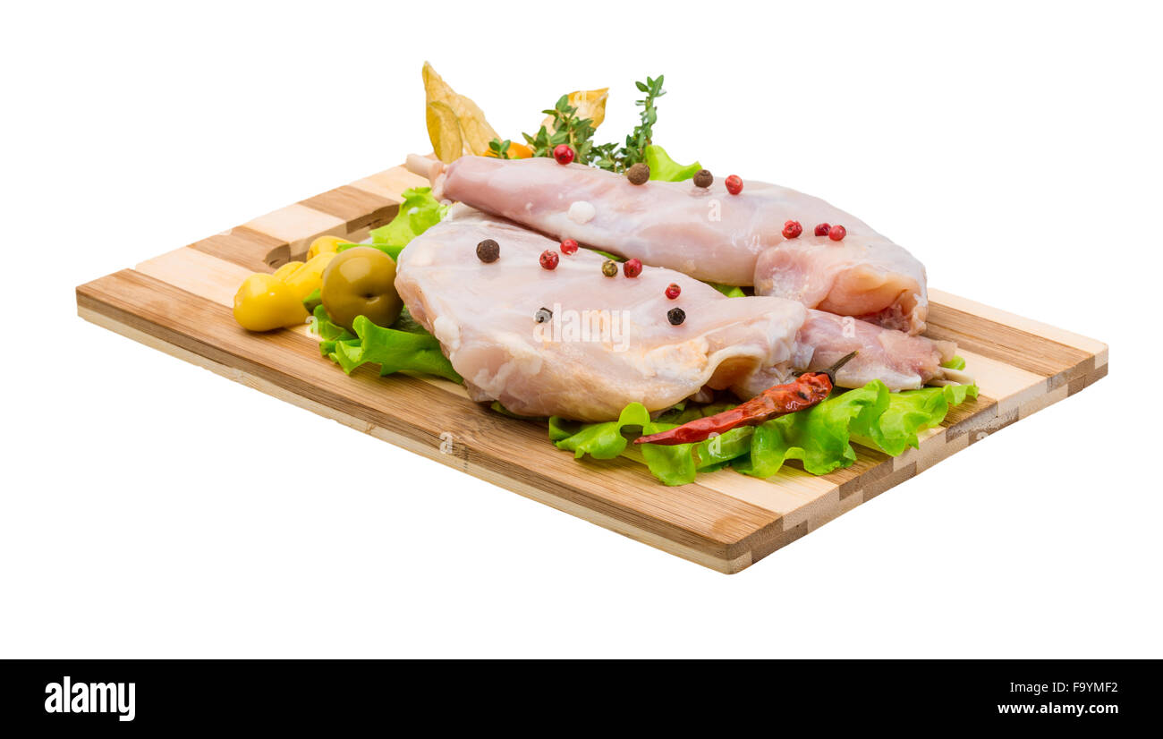 Raw rabbit meat with herbs and spices Stock Photo - Alamy