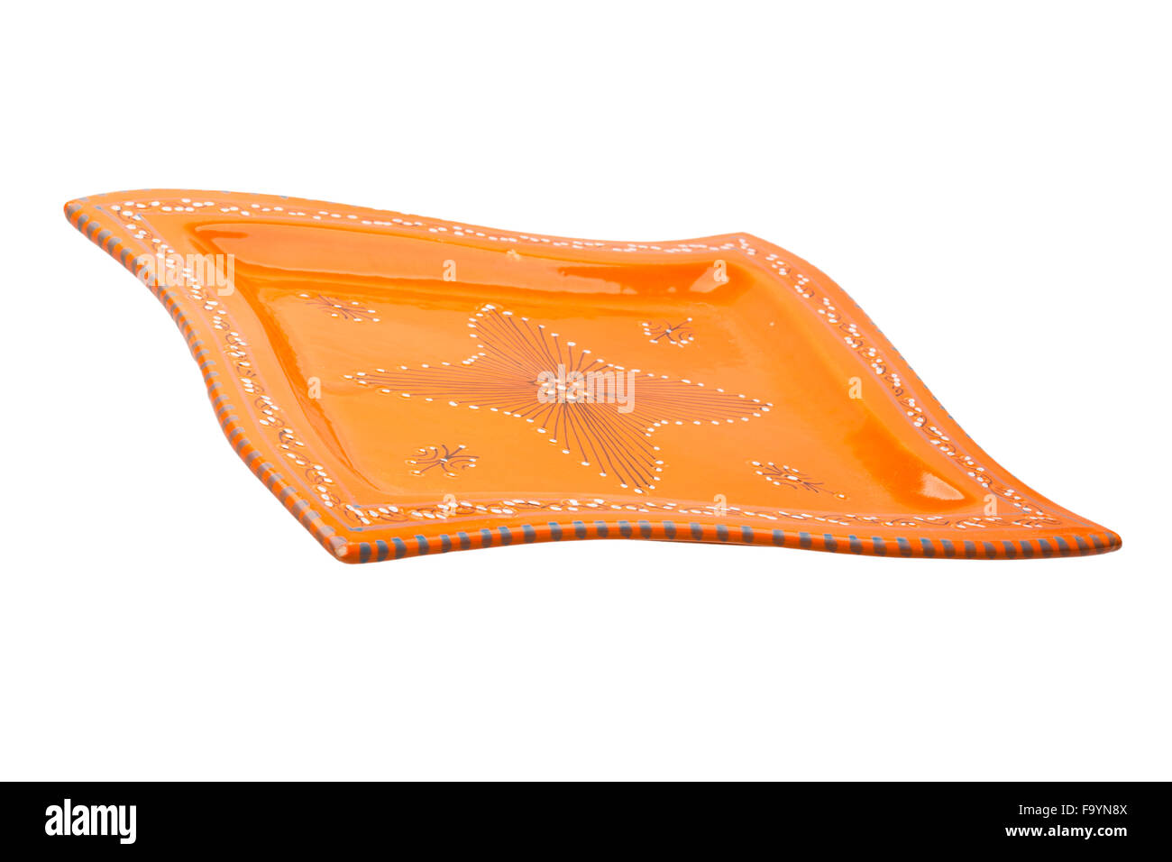 Yellow empty plate isolated Stock Photo - Alamy