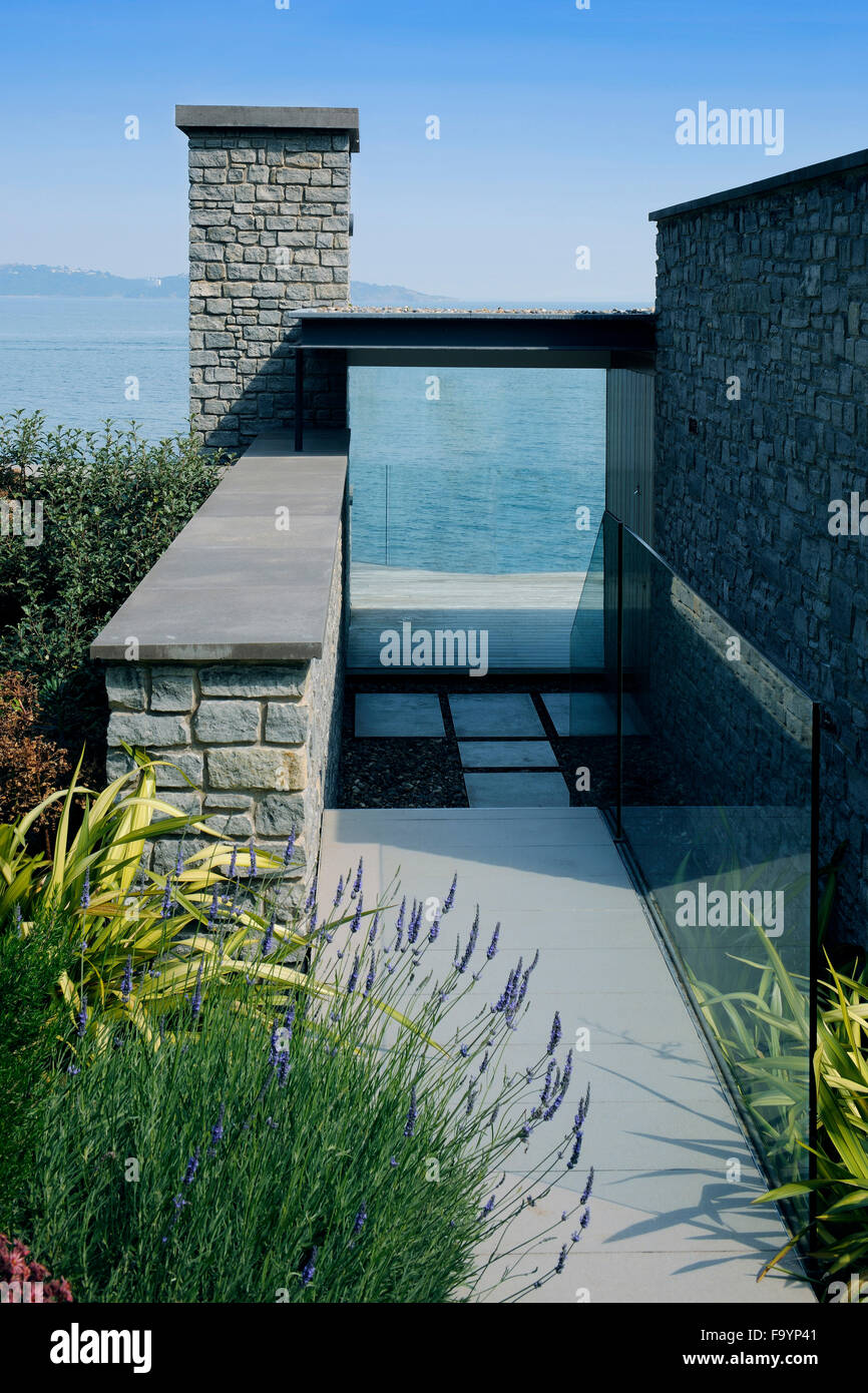 Exterior of a modern house from the patio, looking in to the main ...