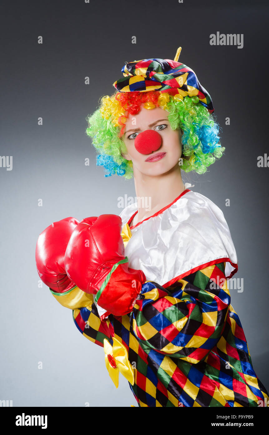 Clown with boxing gloves in funny concept Stock Photo - Alamy
