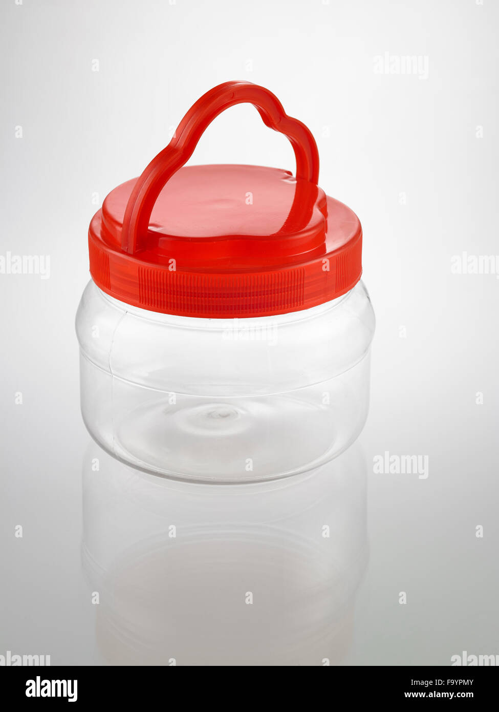 empty cookies container on top of glass table Stock Photo - Alamy