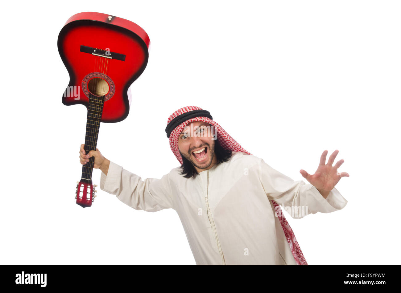 Arab man playing isolated on white Stock Photo - Alamy