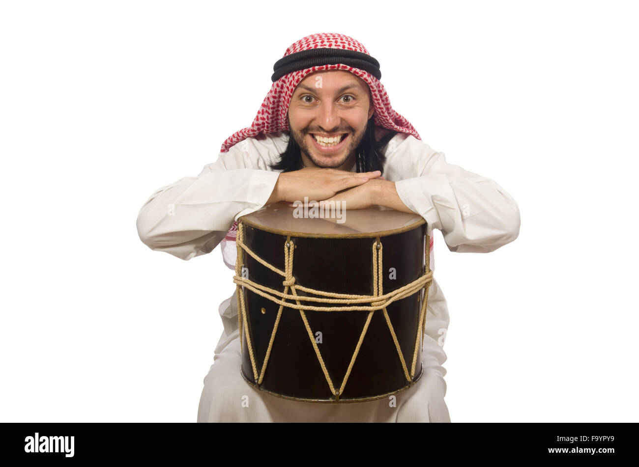 Arab man playing drum isolated on white Stock Photo - Alamy