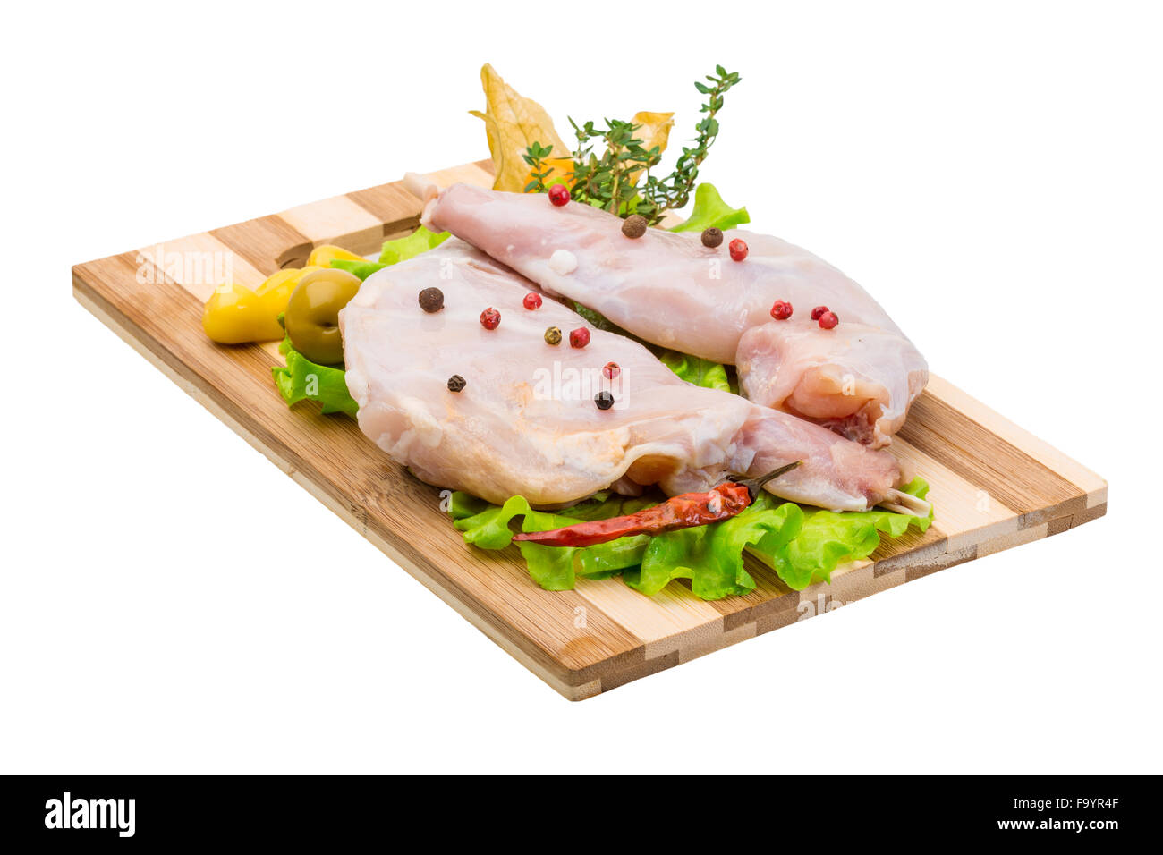Raw rabbit meat with herbs and spices Stock Photo - Alamy