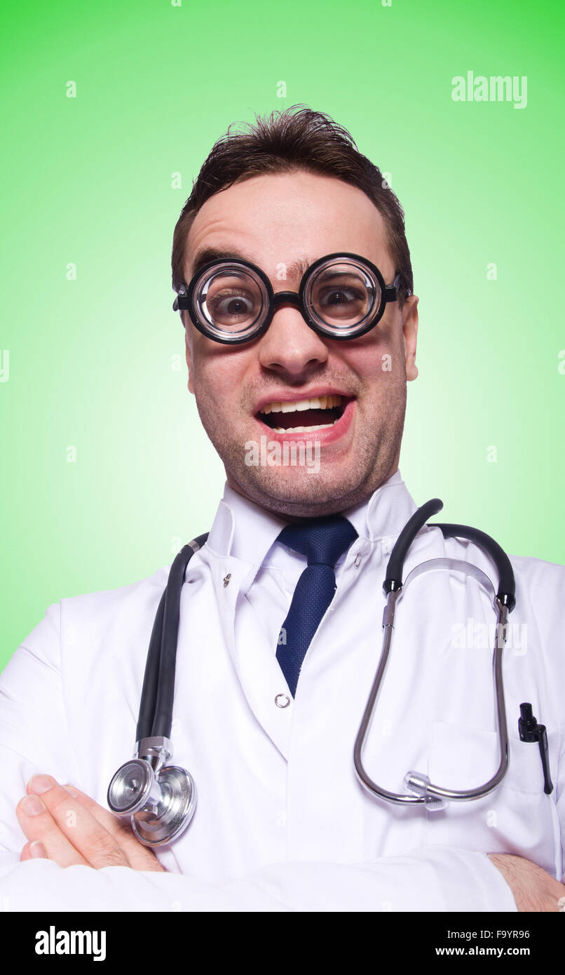 Funny doctor isolated on the white Stock Photo - Alamy