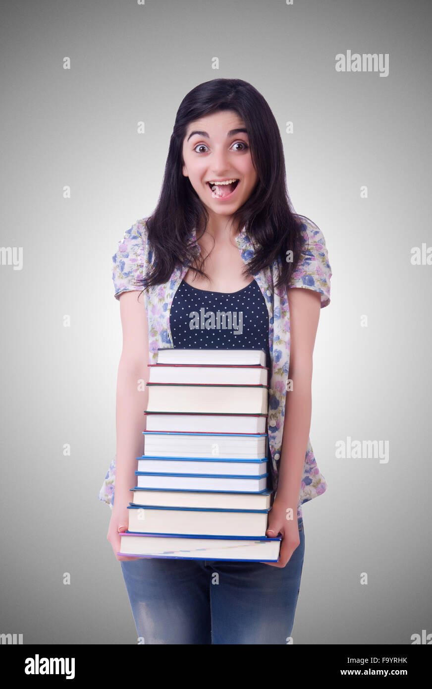 Girl student with books on white Stock Photo - Alamy