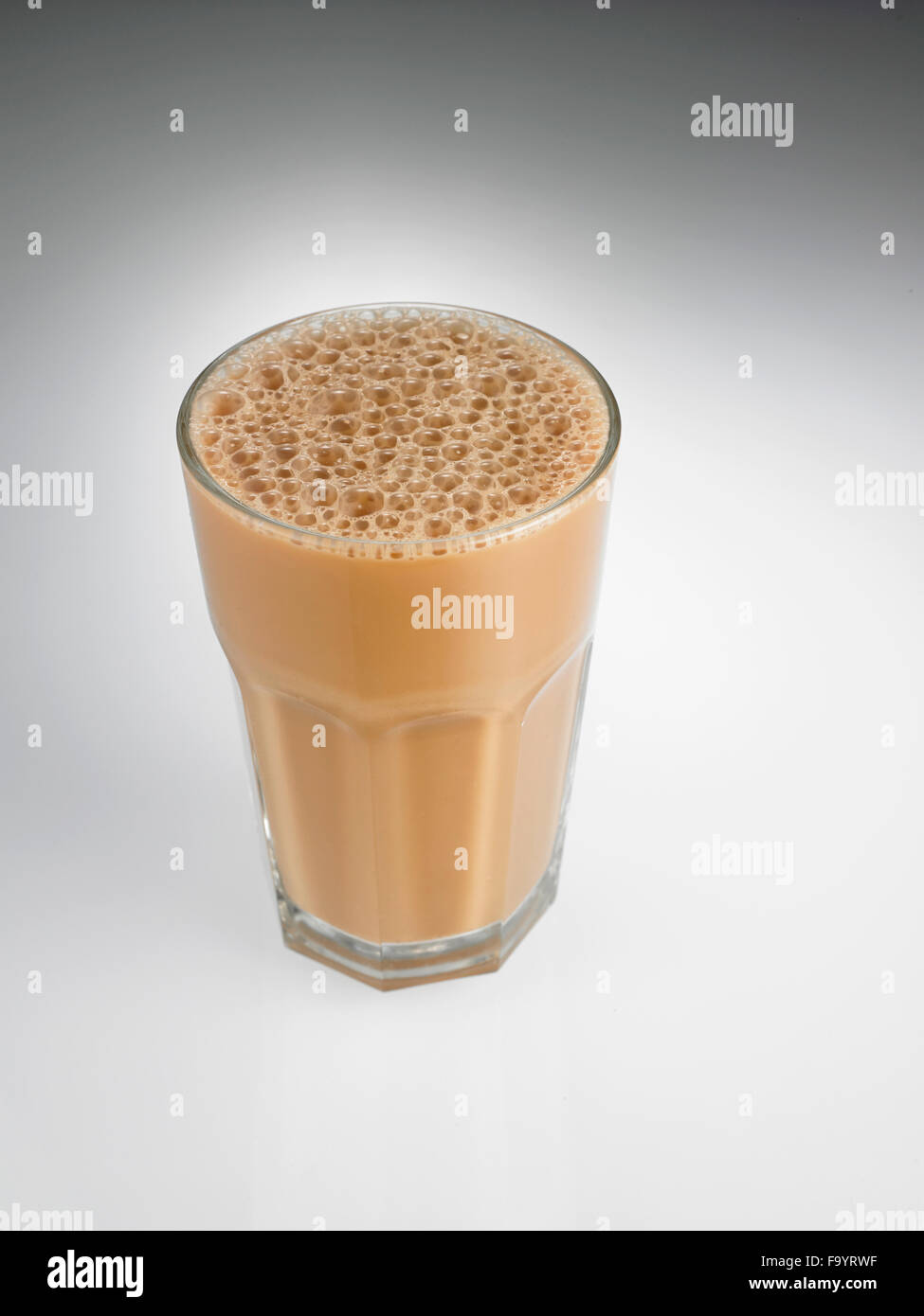 Big glass Tea with milk or Teh Tarik in Malaysia Stock Photo - Alamy